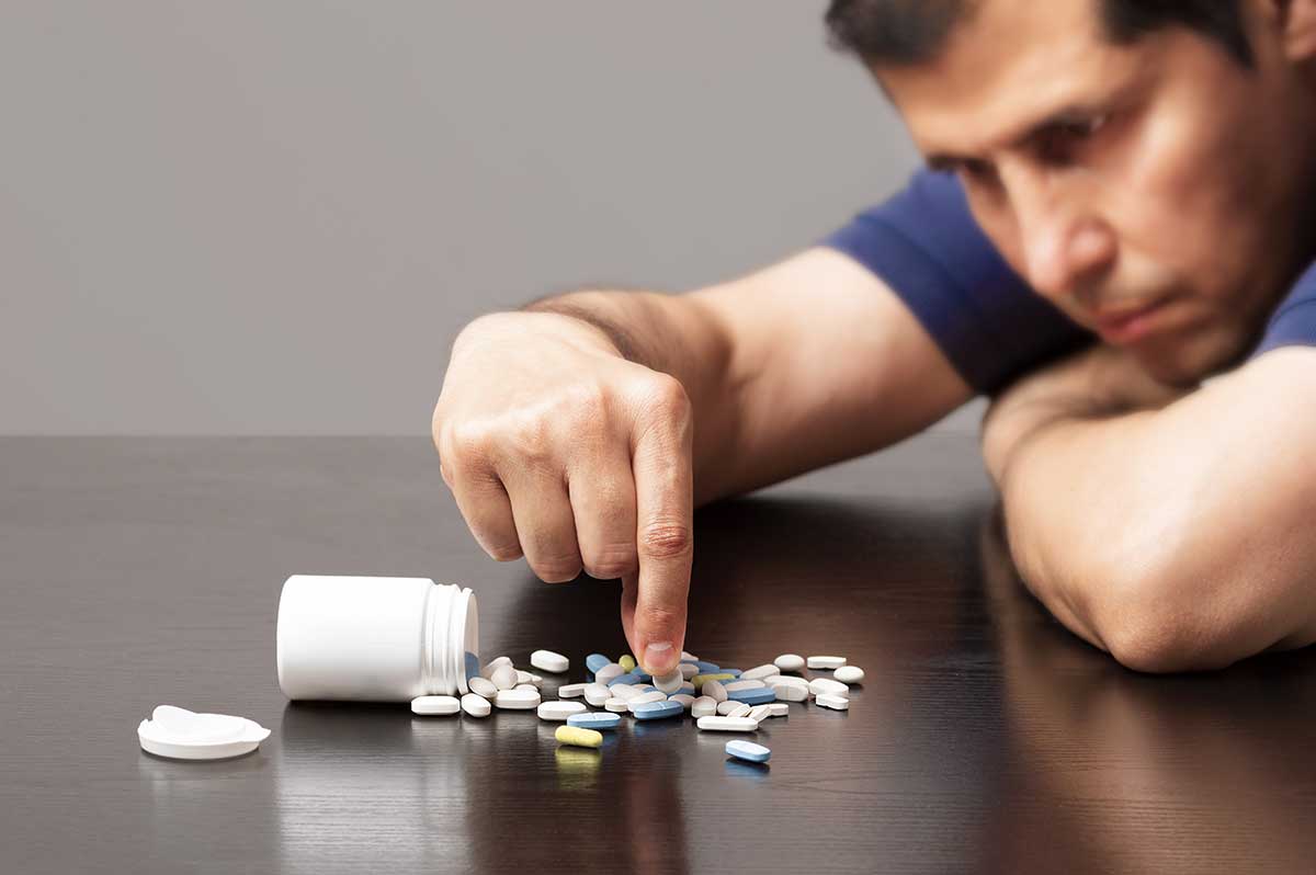 Understanding Painkiller Addiction: How It Happens, Signs to Watch For ...